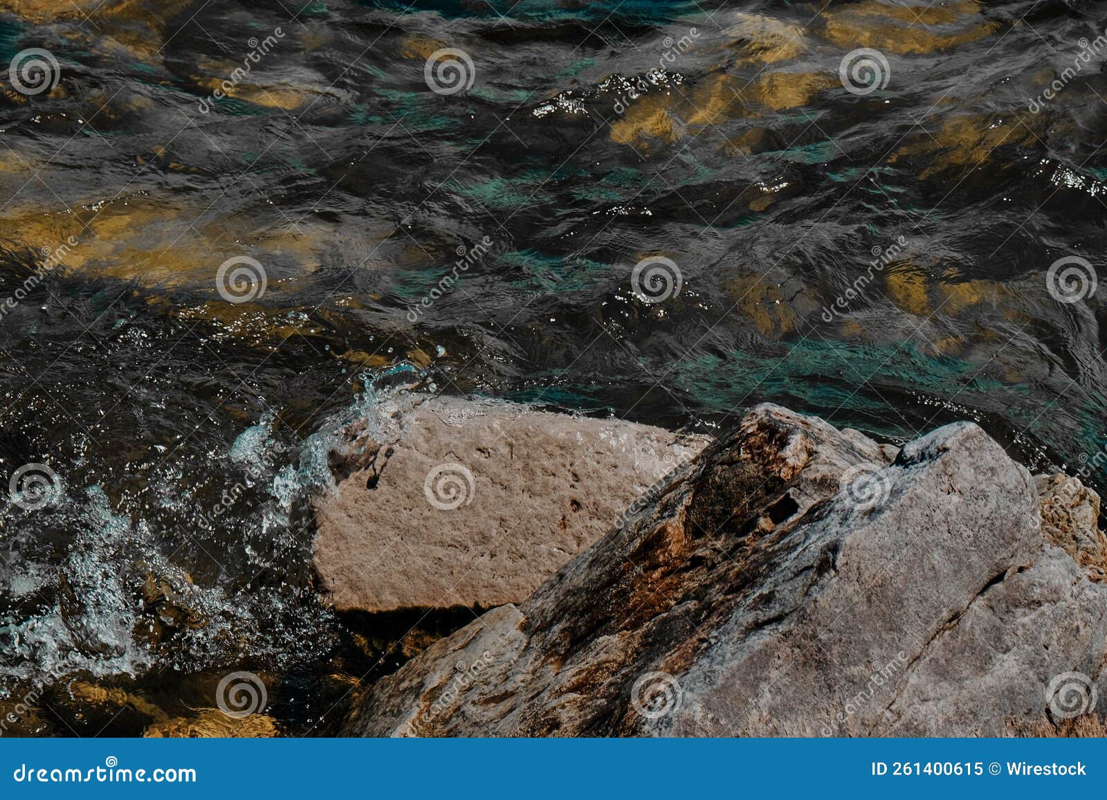 Water flowing into rocks stock image. Image of grunge - 261400615