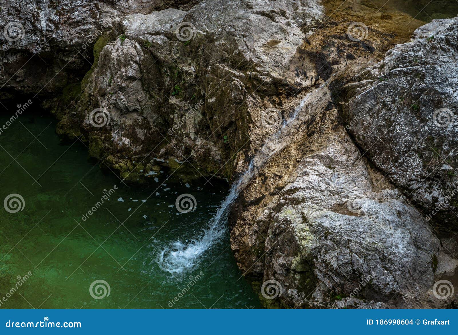 Clear and Fresh Water Flows from Mountain Spring into River Stock Photo ...