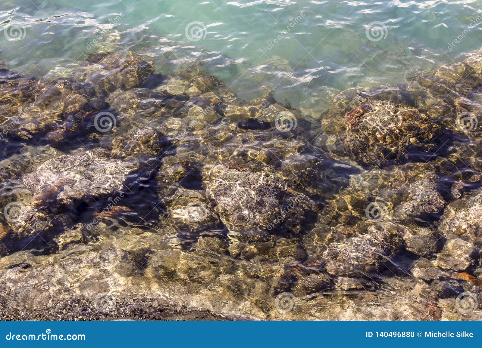 Looking Down at Rocks Below the Water Line in the Occean Stock Photo ...