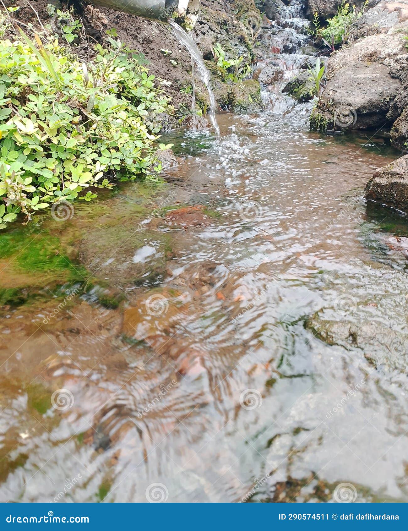Clear Water Sources that Flow through Pipes and Hills Stock Image ...