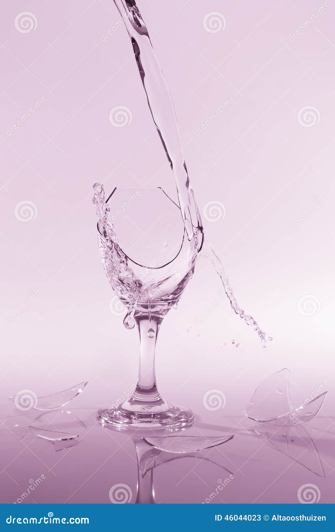 Clear Water Spill from a Broken Wine Glass on Colour Background Stock ...