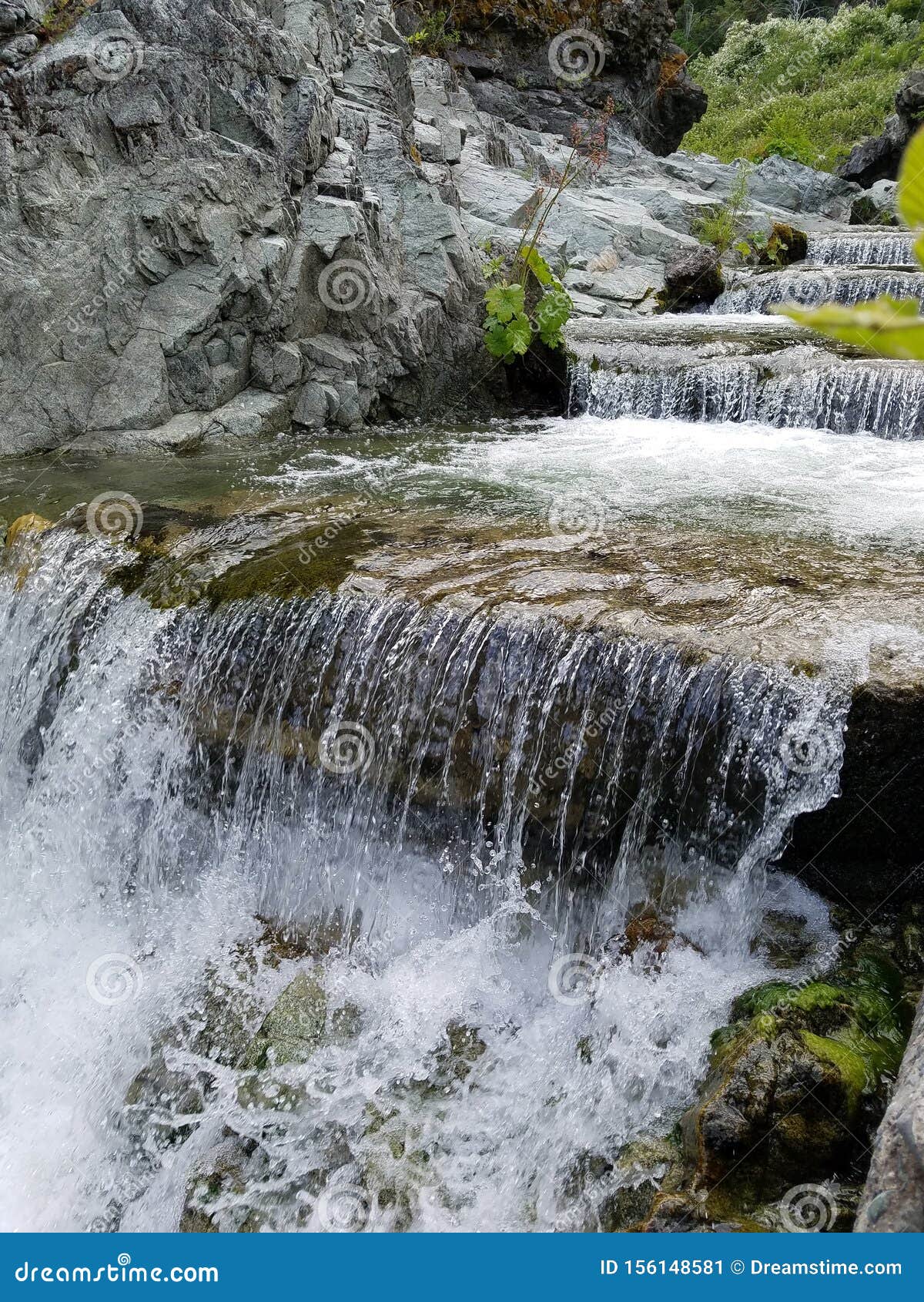 Crystal clear Waterfall stock image. Image of water - 156148581