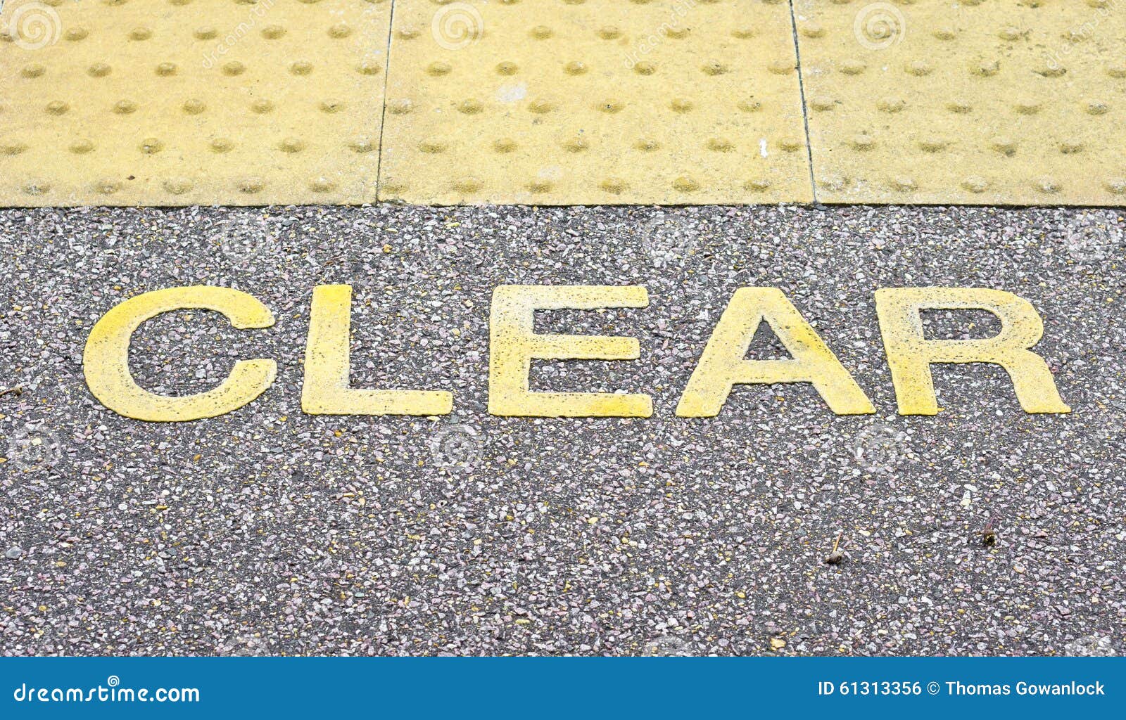 Clear stock photo. Image of path, yellow, slabs, letters - 61313356