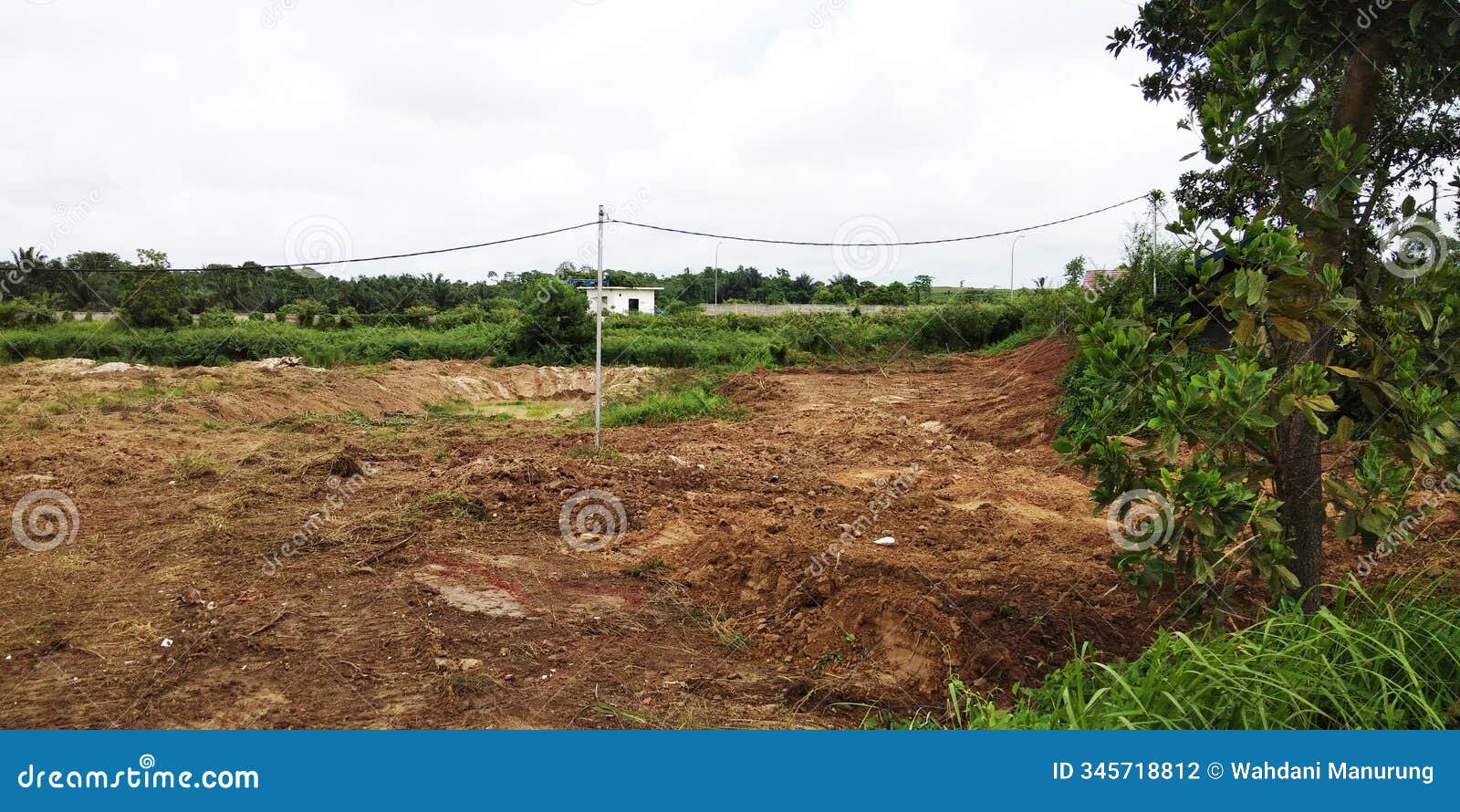 Cleared Earthwork with Distant Structures Stock Photo - Image of ...