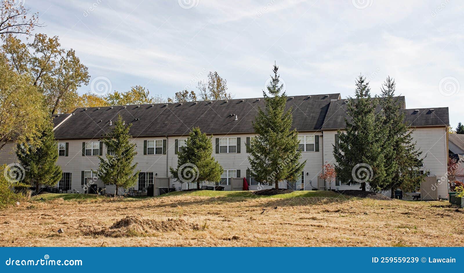 Back of Condo Building with Cleared Land Stock Image - Image of condos ...