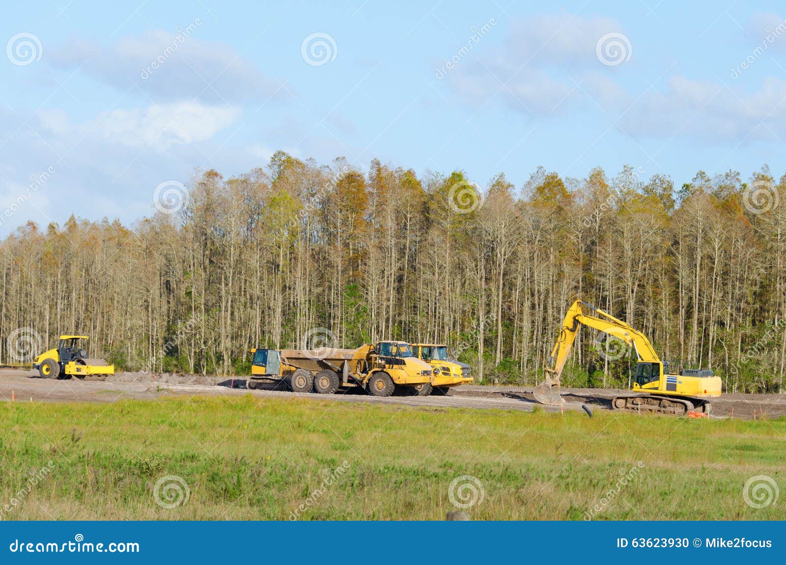 Clearing a Forest with Bulldozers and Work Trucks Stock Photo - Image ...