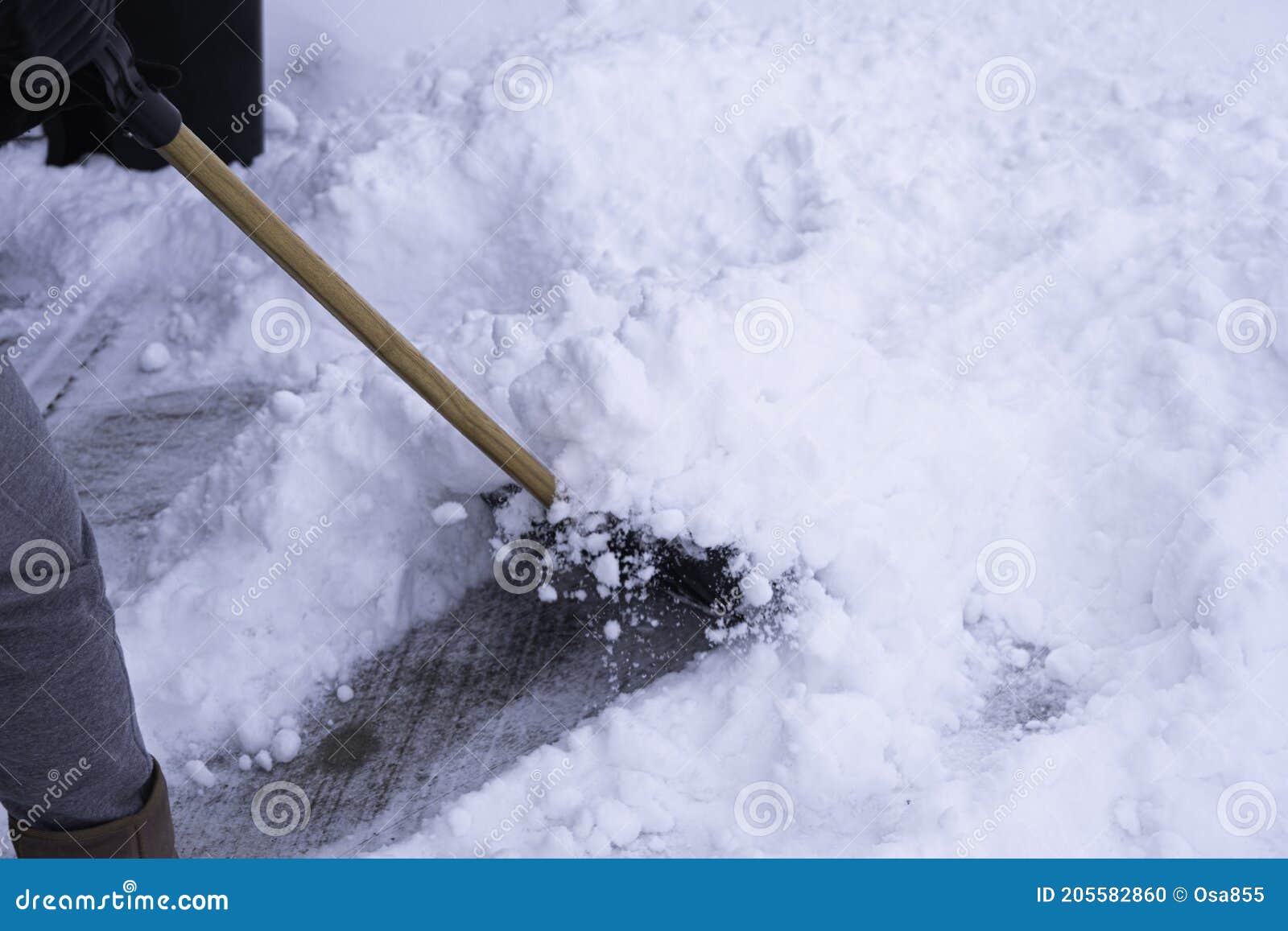 Clearing Snow from Driveway after Heavy Winter Storm Stock Photo ...
