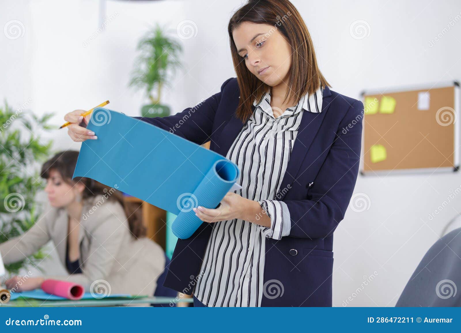 Clerical Worker Unrolling Blue Scroll Stock Image - Image of training ...