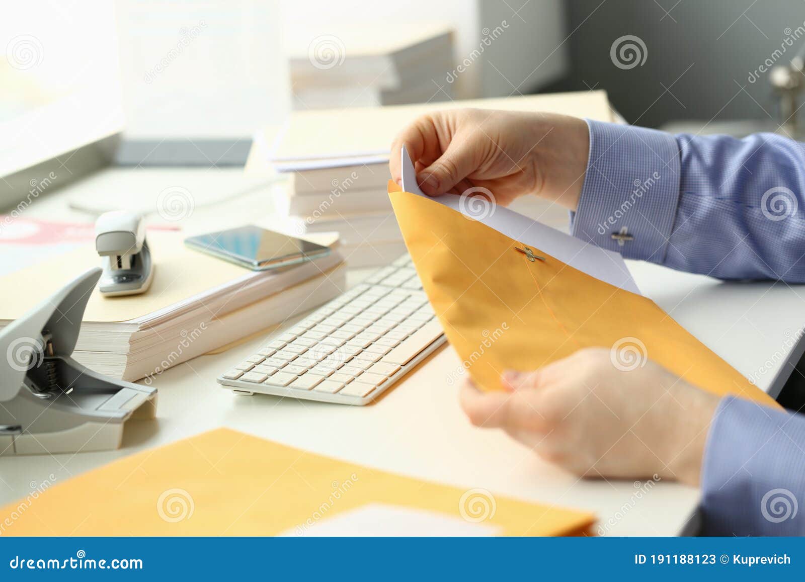Clerk Packing Documents into Folder at Desk Stock Image - Image of ...