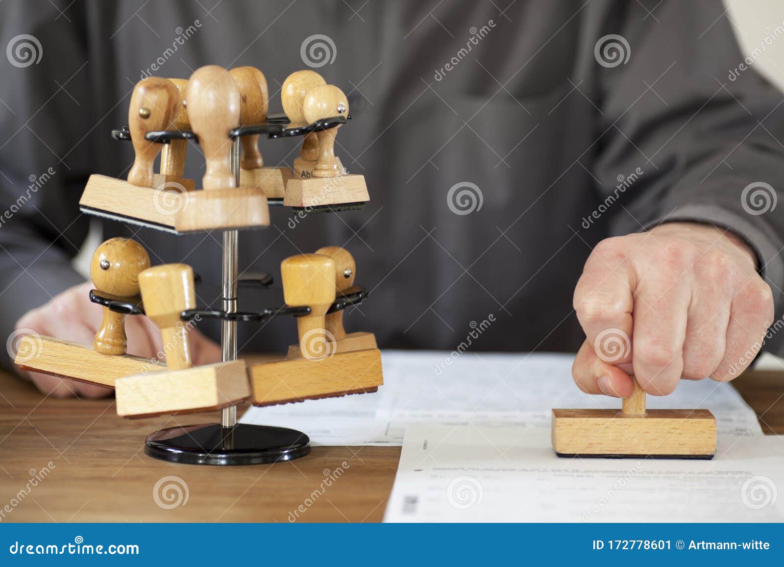 Clerk with Stamp Does Approval of a Document Stock Image - Image of ...