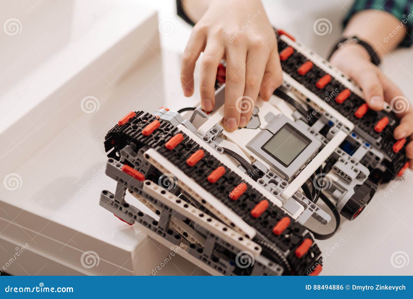 Clever Child Programming Electronic Robot in the Studio Stock Photo ...