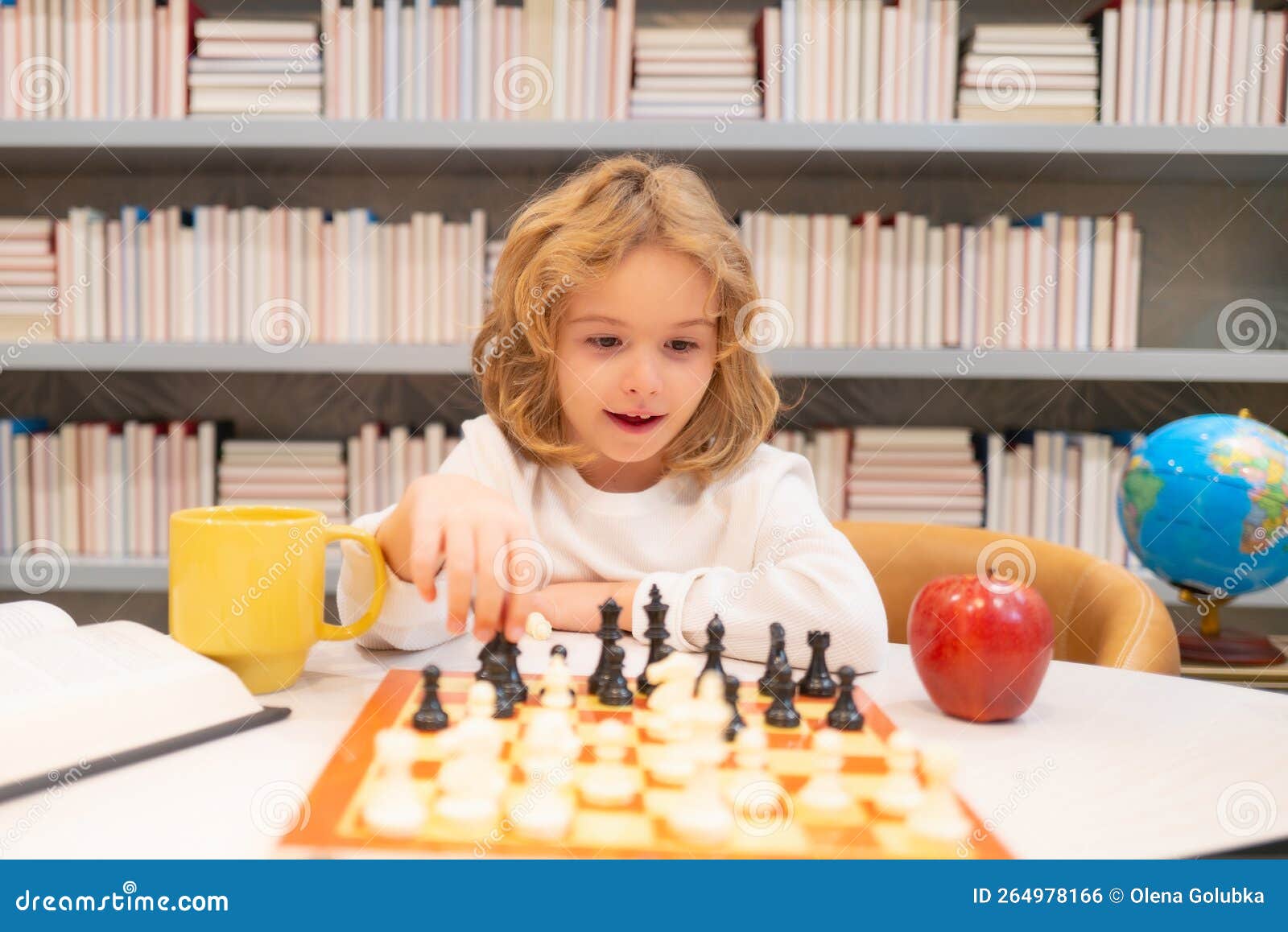 Clever Concentrated and Thinking Child Playing Chess. Stock Photo ...