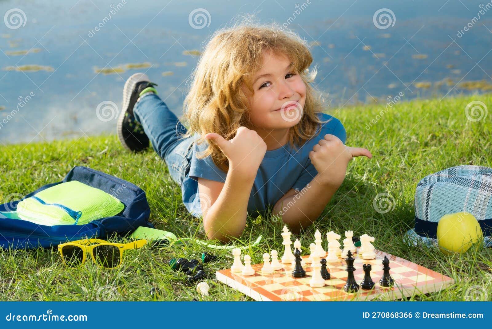 Clever Concentrated and Thinking Child Playing Chess. Stock Photo ...