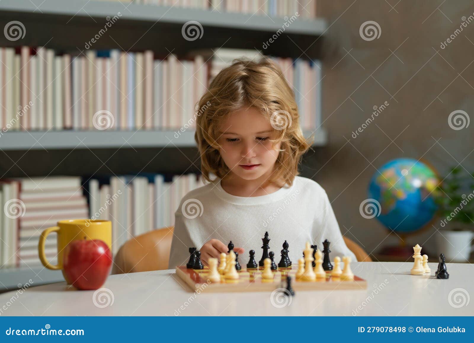 Clever Concentrated and Thinking Child Playing Chess. Stock Photo ...