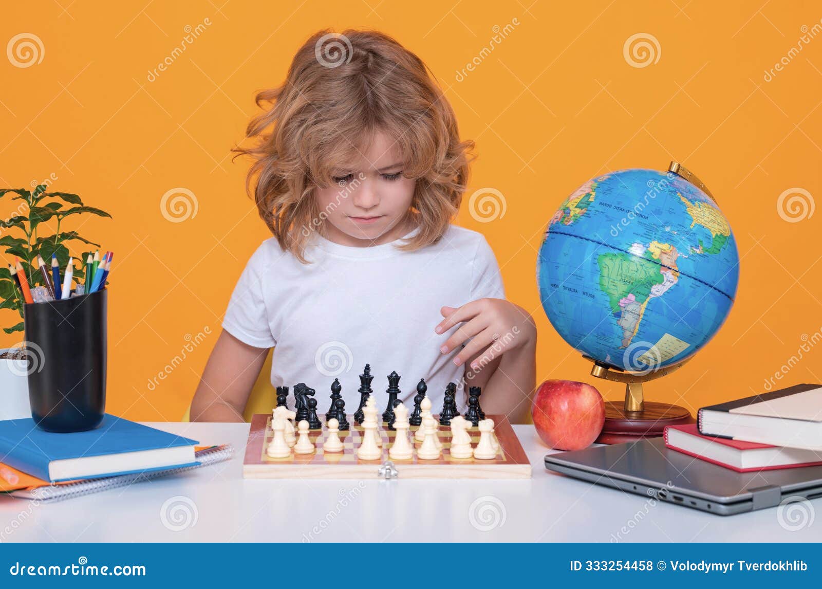 Clever Concentrated and Thinking Child Playing Chess. Child Boy ...