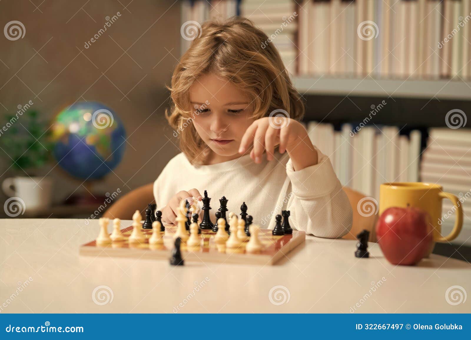 Clever Concentrated and Thinking Child Playing Chess. Logic Game for ...