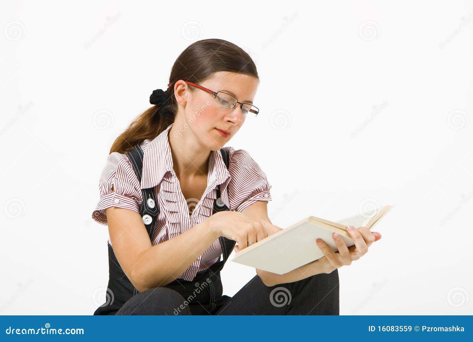 Clever girl reading a book stock image. Image of emotion - 16083559