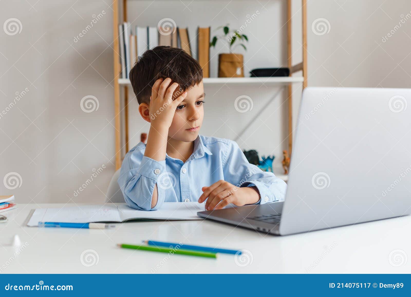 Clever Kid Tired To Learn Difficult Homework Using Laptop and Internet ...