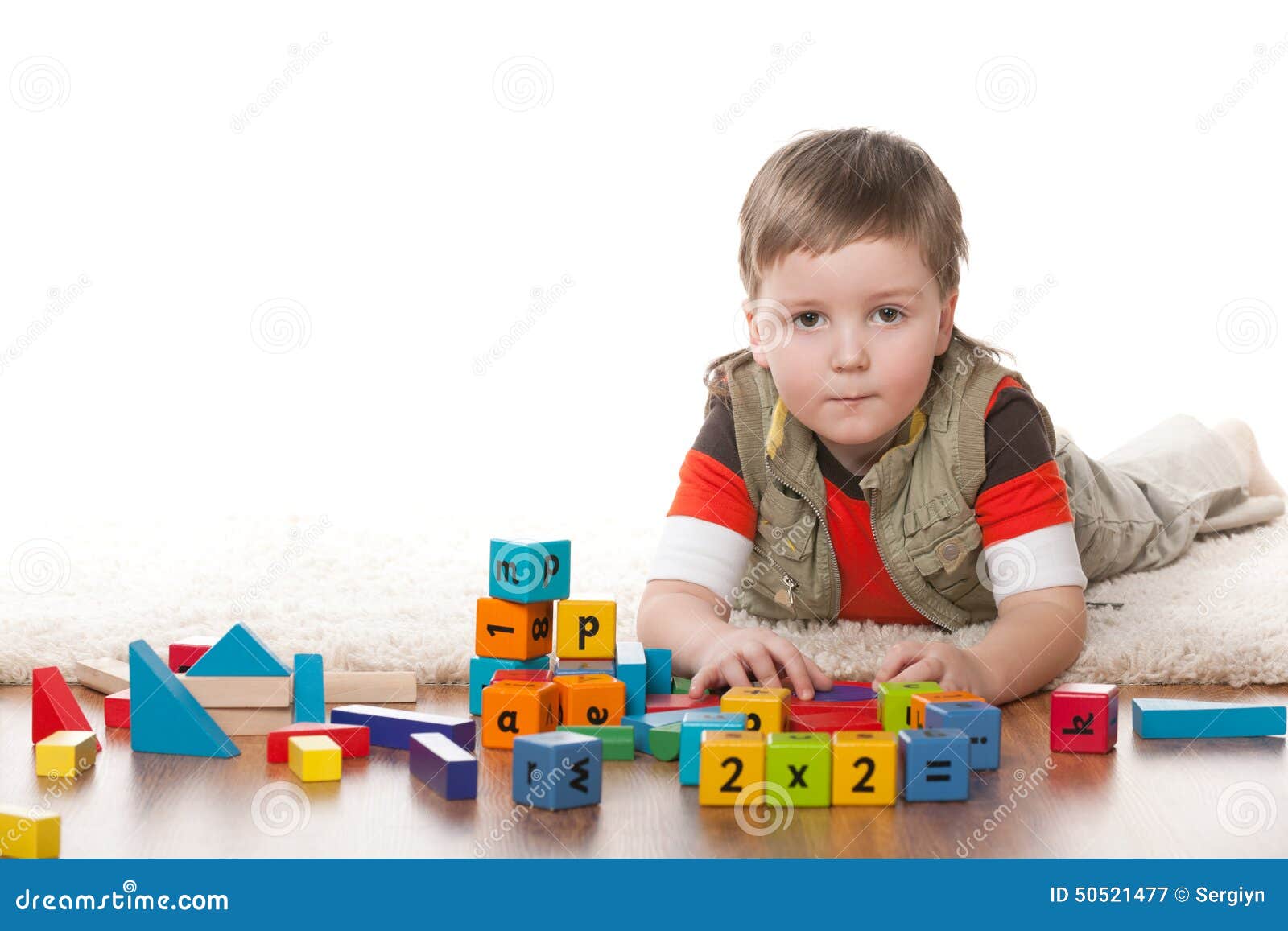 Clever little boy plays stock image. Image of kindergarten - 50521477