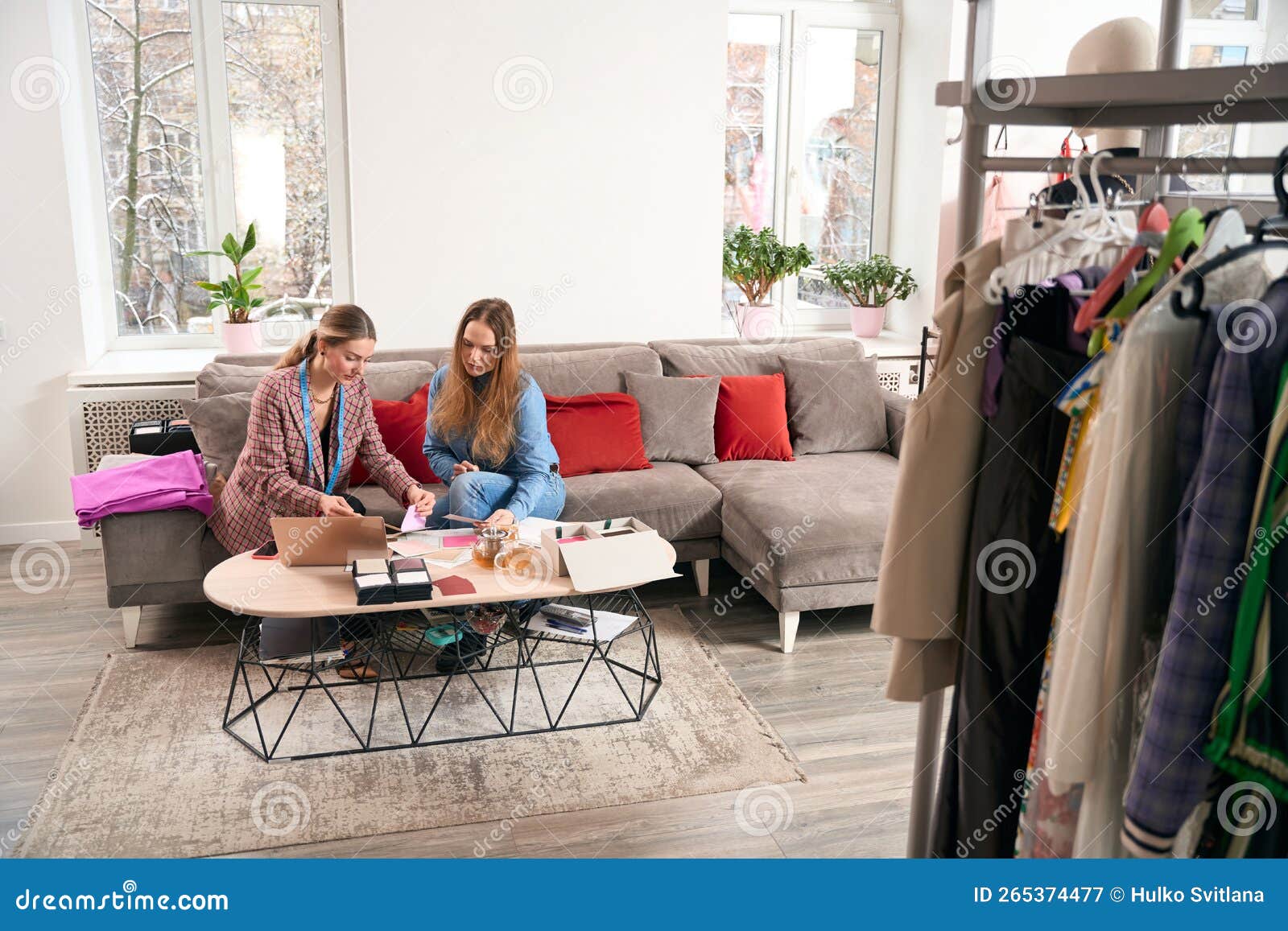 Client and Consultant are Sitting on Soft Sofa in Design Studio Stock ...