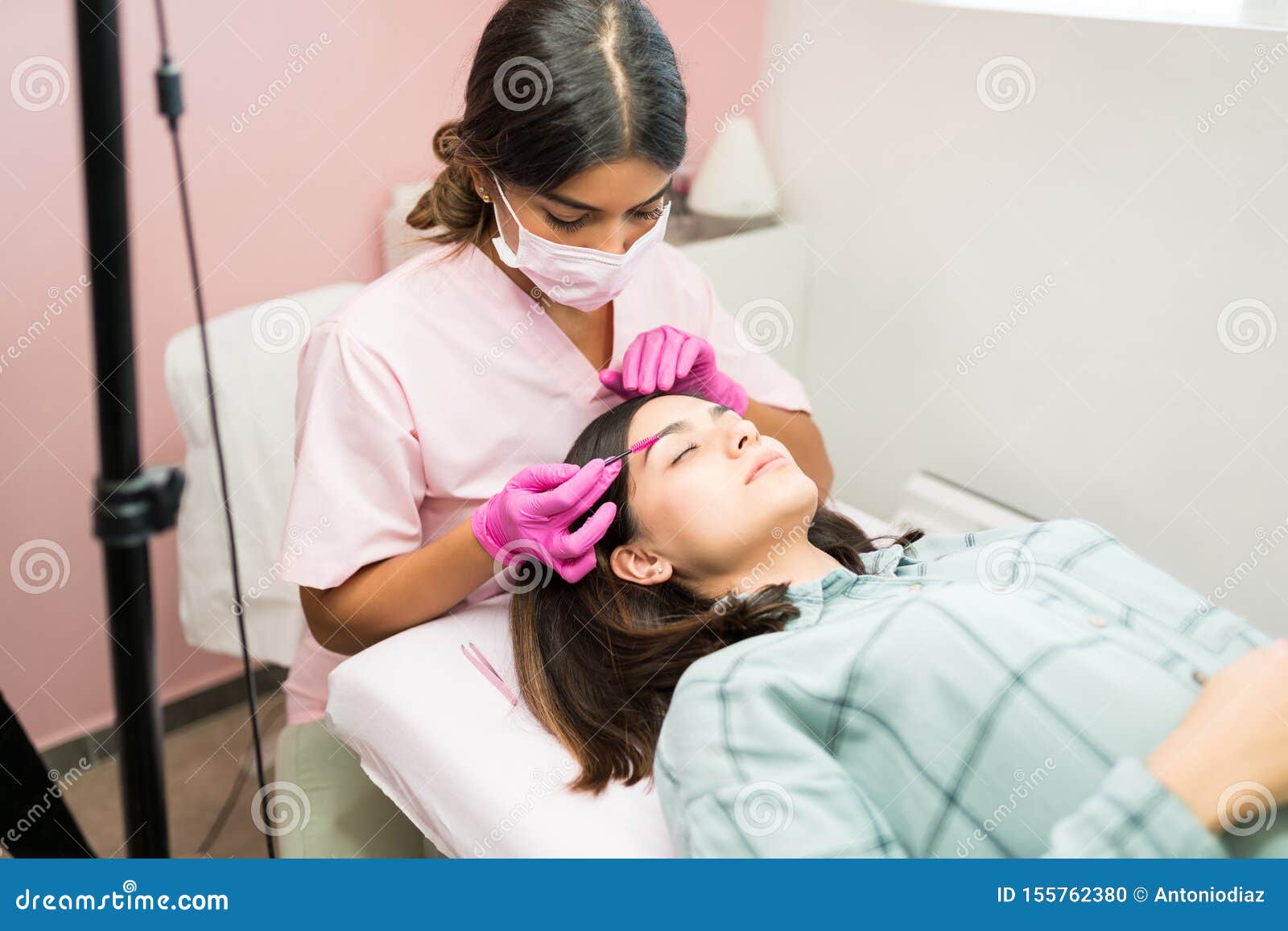 Client Getting Her Eyebrows Done at Spa Stock Photo - Image of service ...