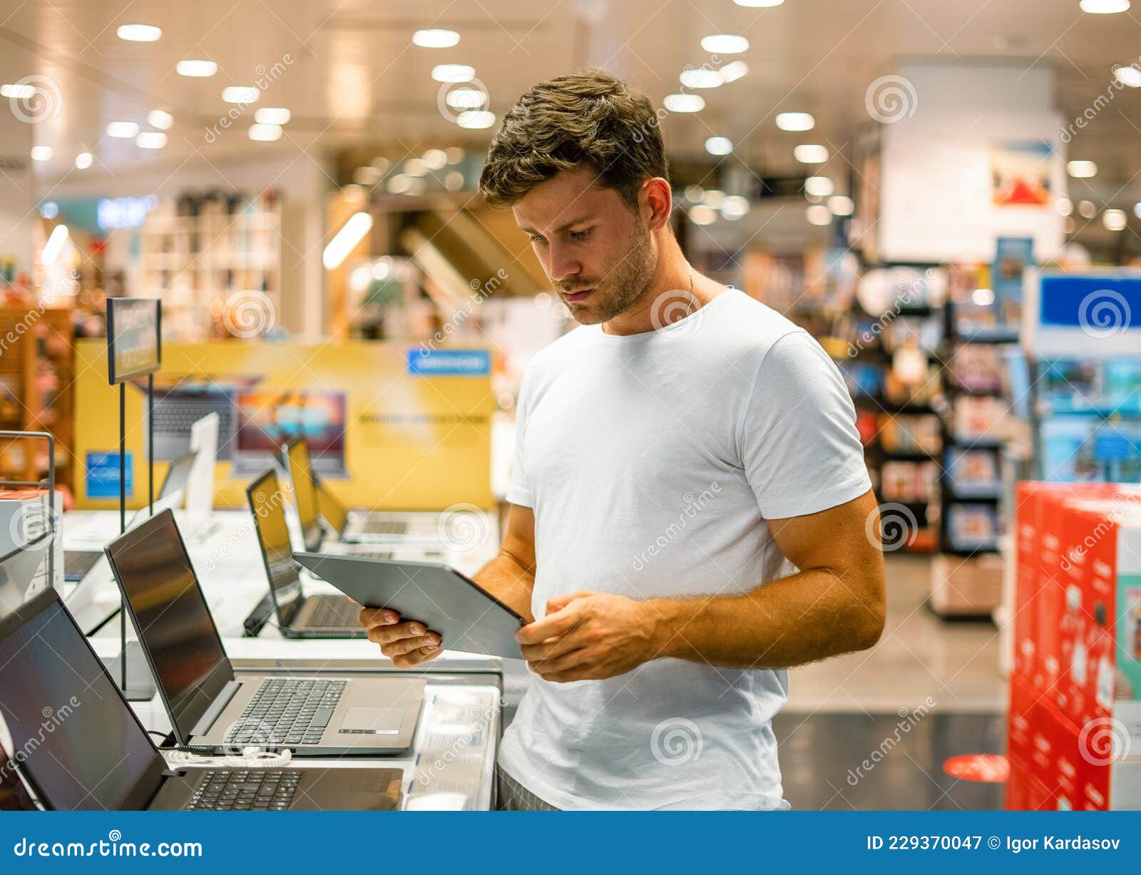Client with Tablet Choosing Gadgets in Shop Stock Image - Image of ...