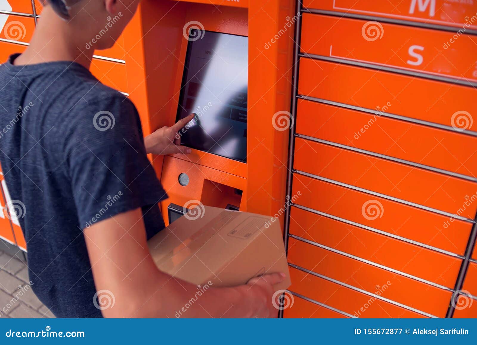 Client Using Automated Self Service Post Terminal Machine or Locker To ...