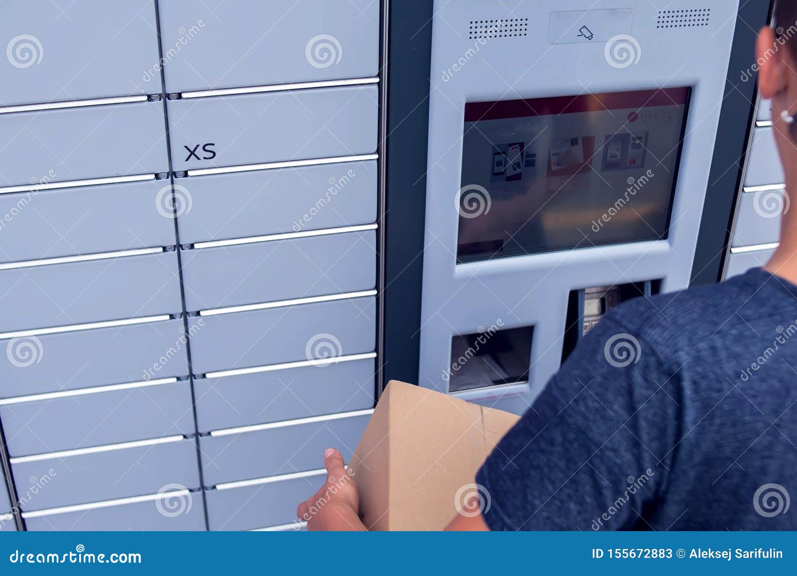 Client Using Automated Self Service Post Terminal Machine or Locker To ...