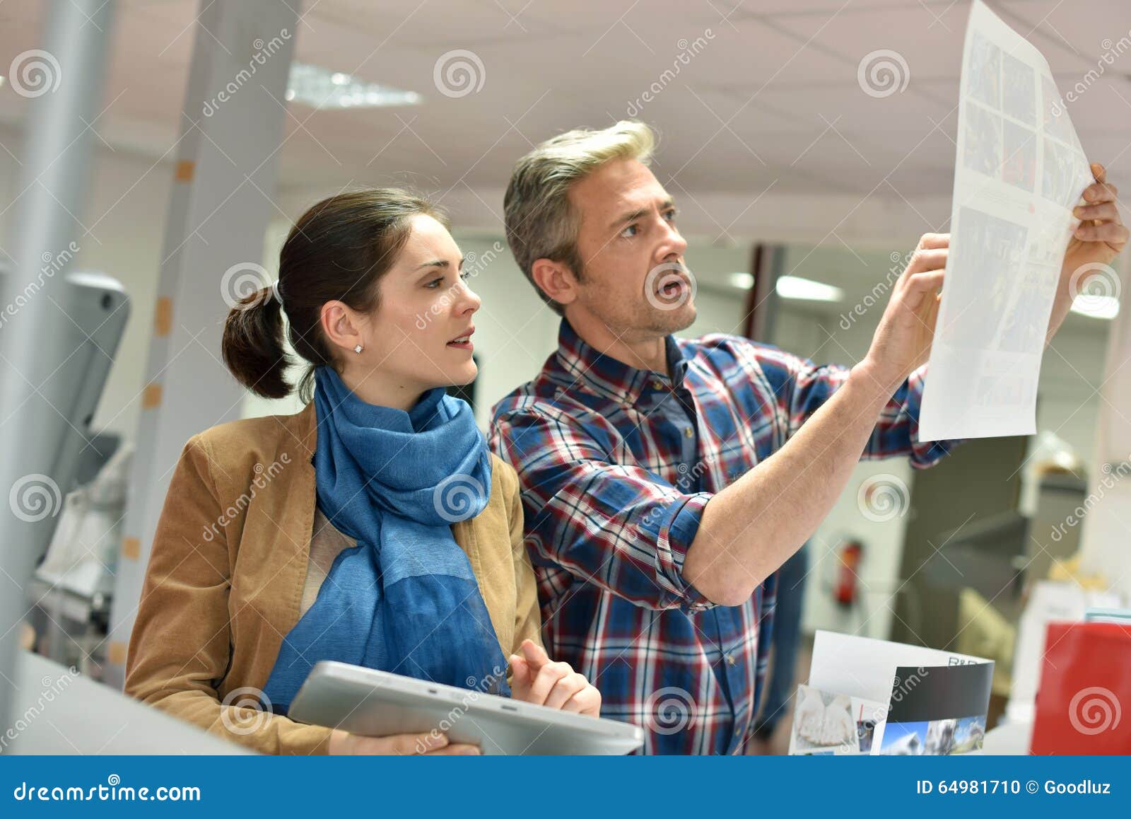 Client and Worker in Printing Industry Checking Product Quality Stock ...