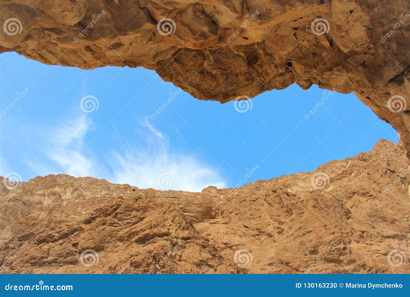 Cliff As Seen from a Cave stock photo. Image of mountain - 130163230