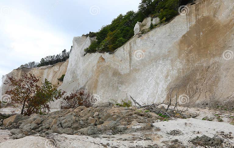 Cliff Eroded by the Elements with Plants at the Summit at Risk of ...