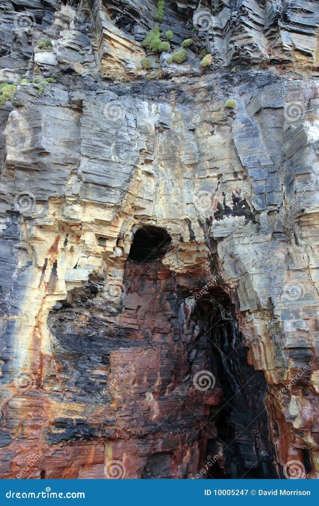 Cliff face cave stock image. Image of ancient, brown - 10005247