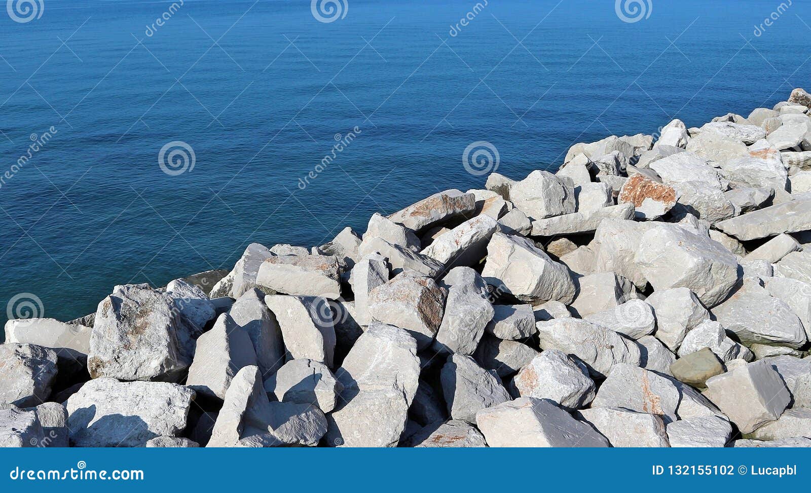 Cliff with Large White Rocks in Front of the Sea. Simple Minimalistic ...