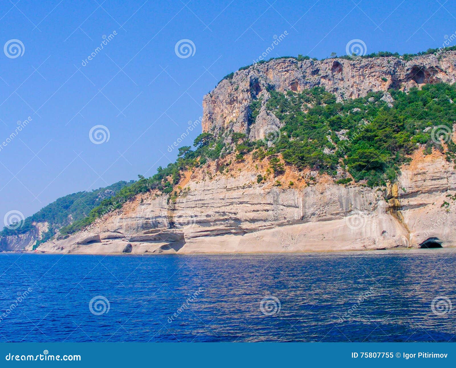 Cliff on the Mediterranean Coast Stock Image - Image of bluff, cave ...