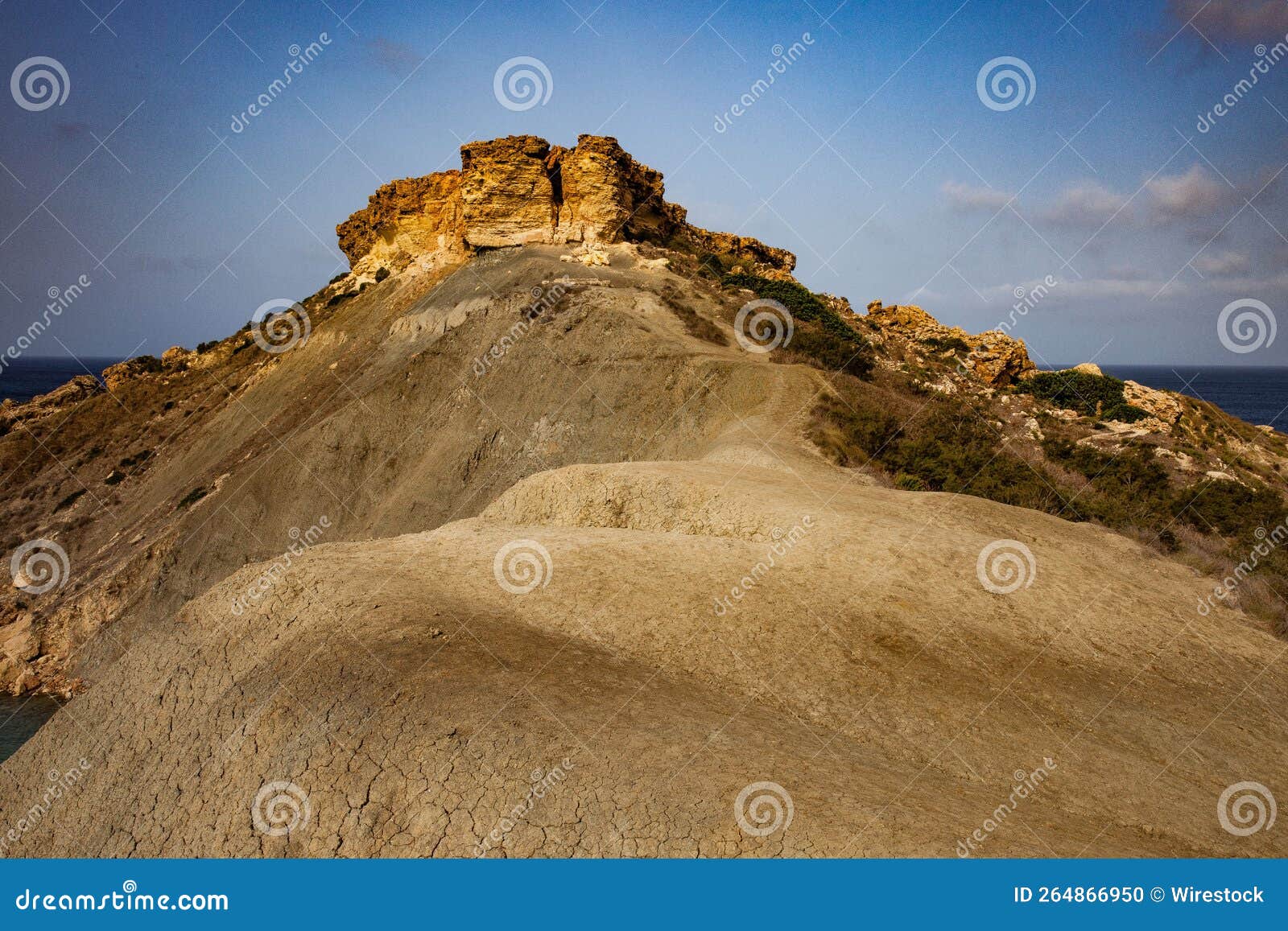 Cliff near the beach stock photo. Image of landscape - 264866950