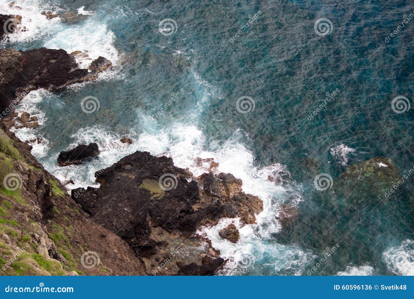 Cliff in the ocean stock photo. Image of view, oahu, rocks - 60596136