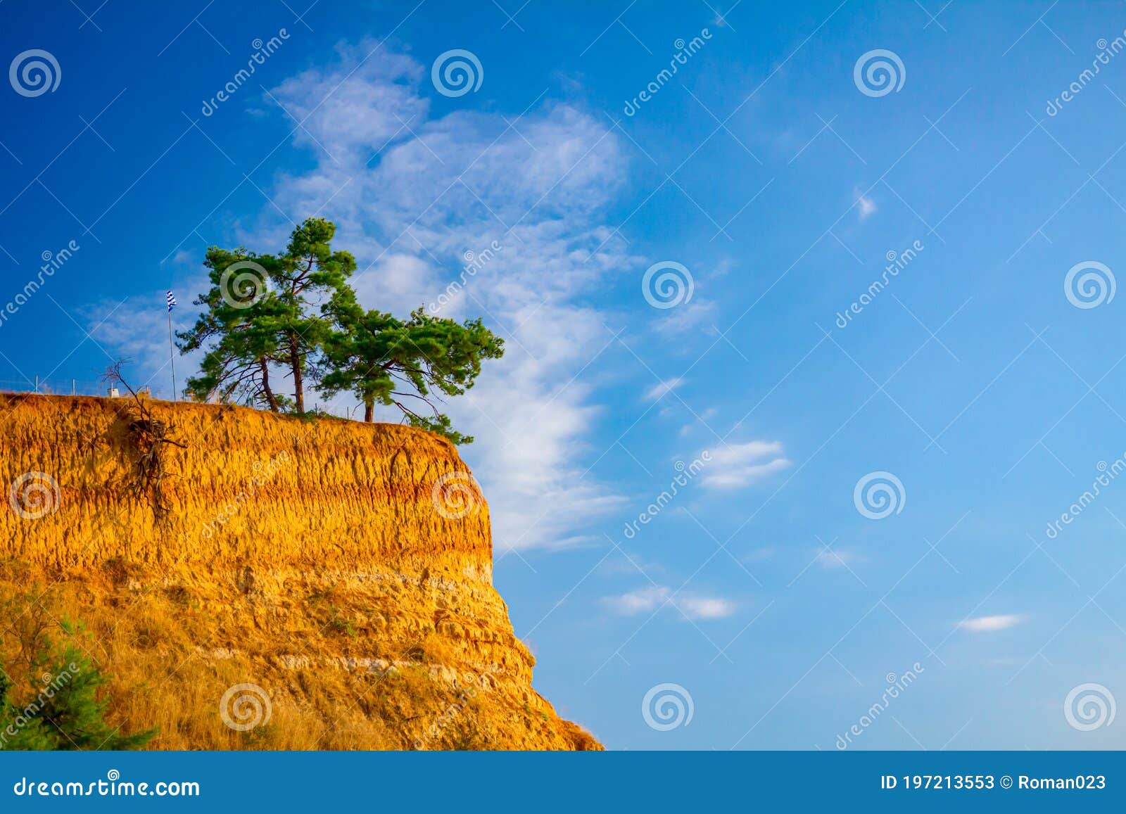 Cliff with Pine Trees and Greek Flag on the Top Stock Image - Image of ...