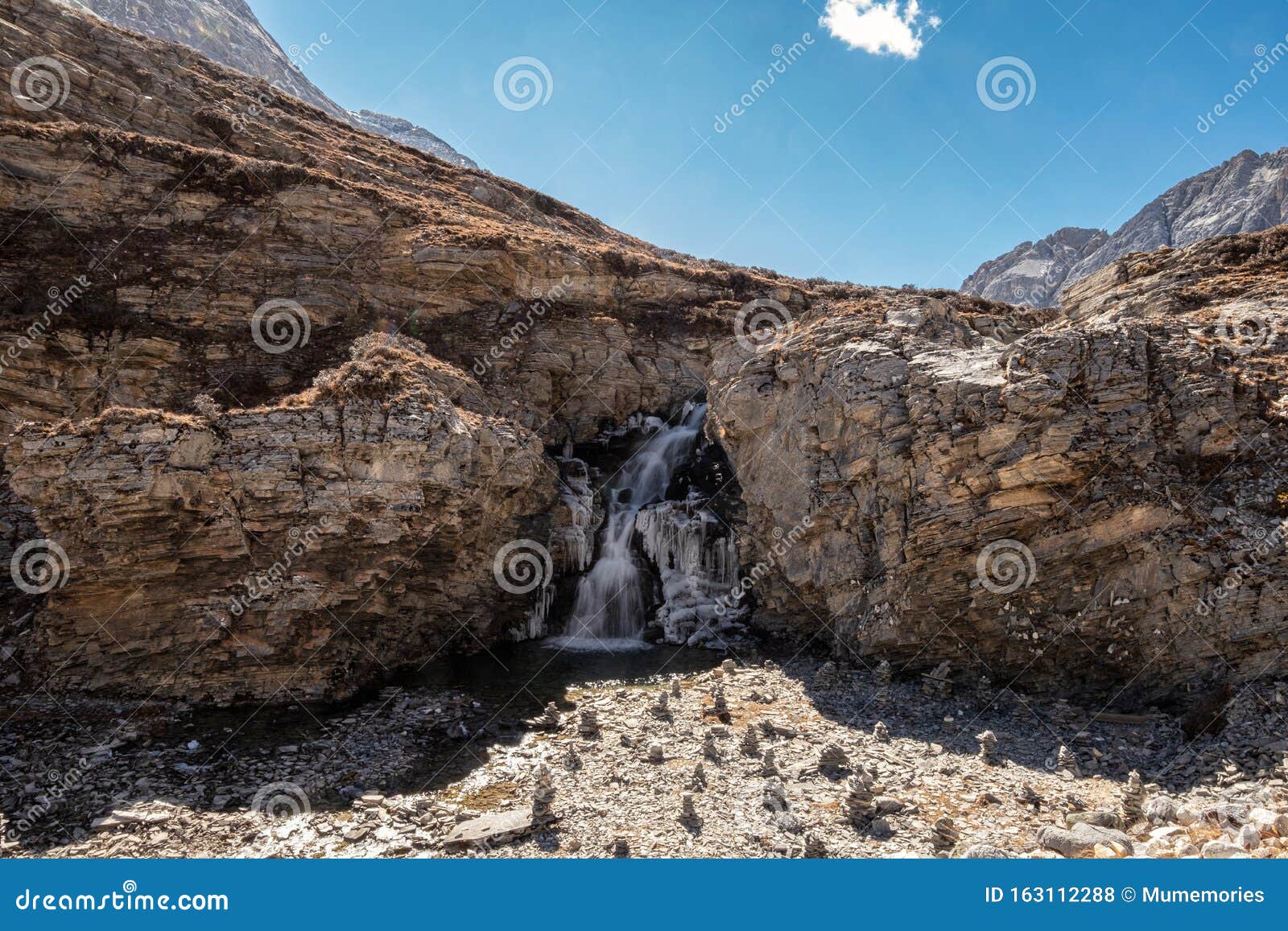 Cliff Rock with Waterfall Flowing in Stream Stock Photo - Image of ...