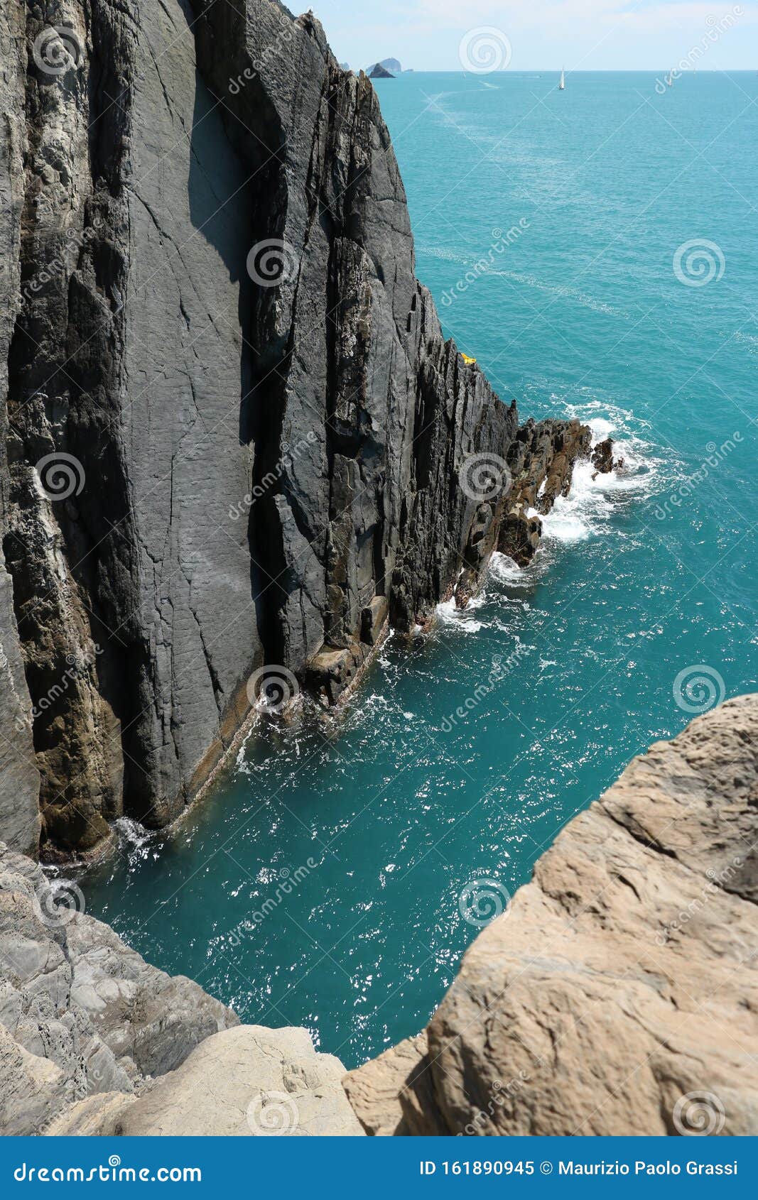 Cliff with Rocks that Plunge into the Blue Sea of the CinqueTerre Stock ...