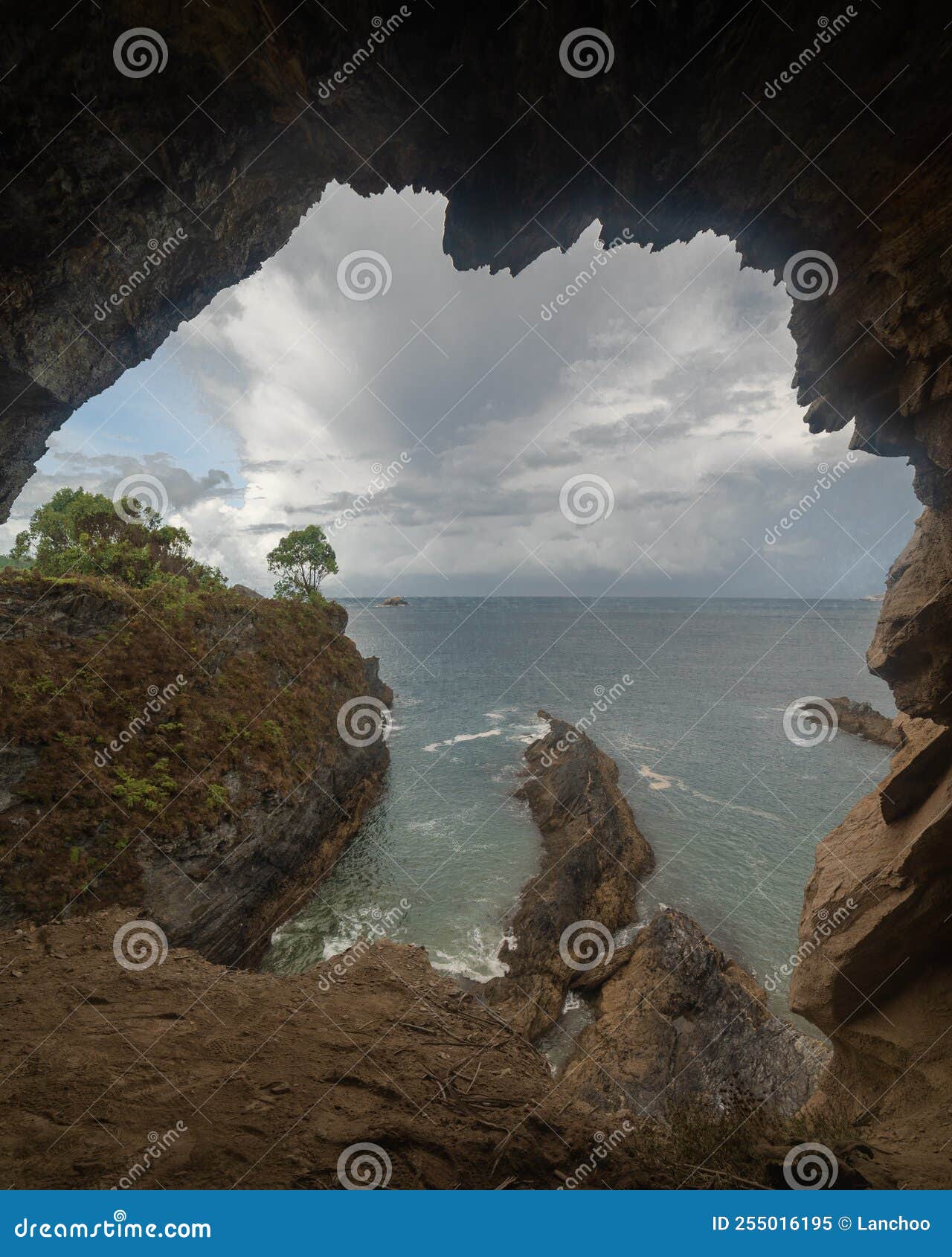 A Cliff Seen from Inside a Cave Stock Image - Image of water, inside ...