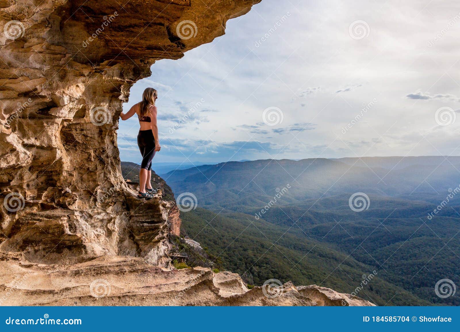 Cliff Side Cave with Mountain Valley Views Stock Photo - Image of rock ...