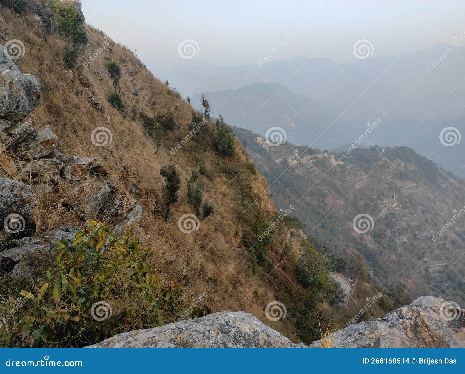 Cliff on top of a mountain stock photo. Image of terrain - 268160514