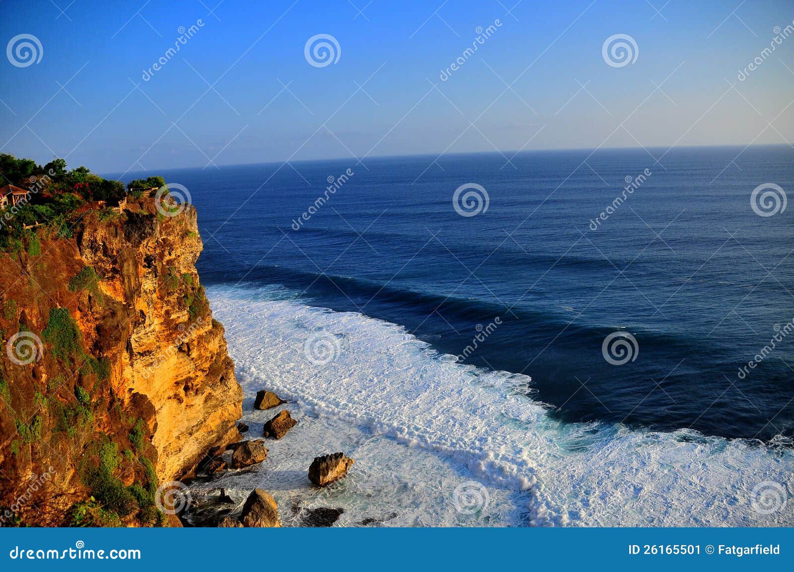Cliff with Wave Under Sunset Stock Image - Image of peaceful, blue ...