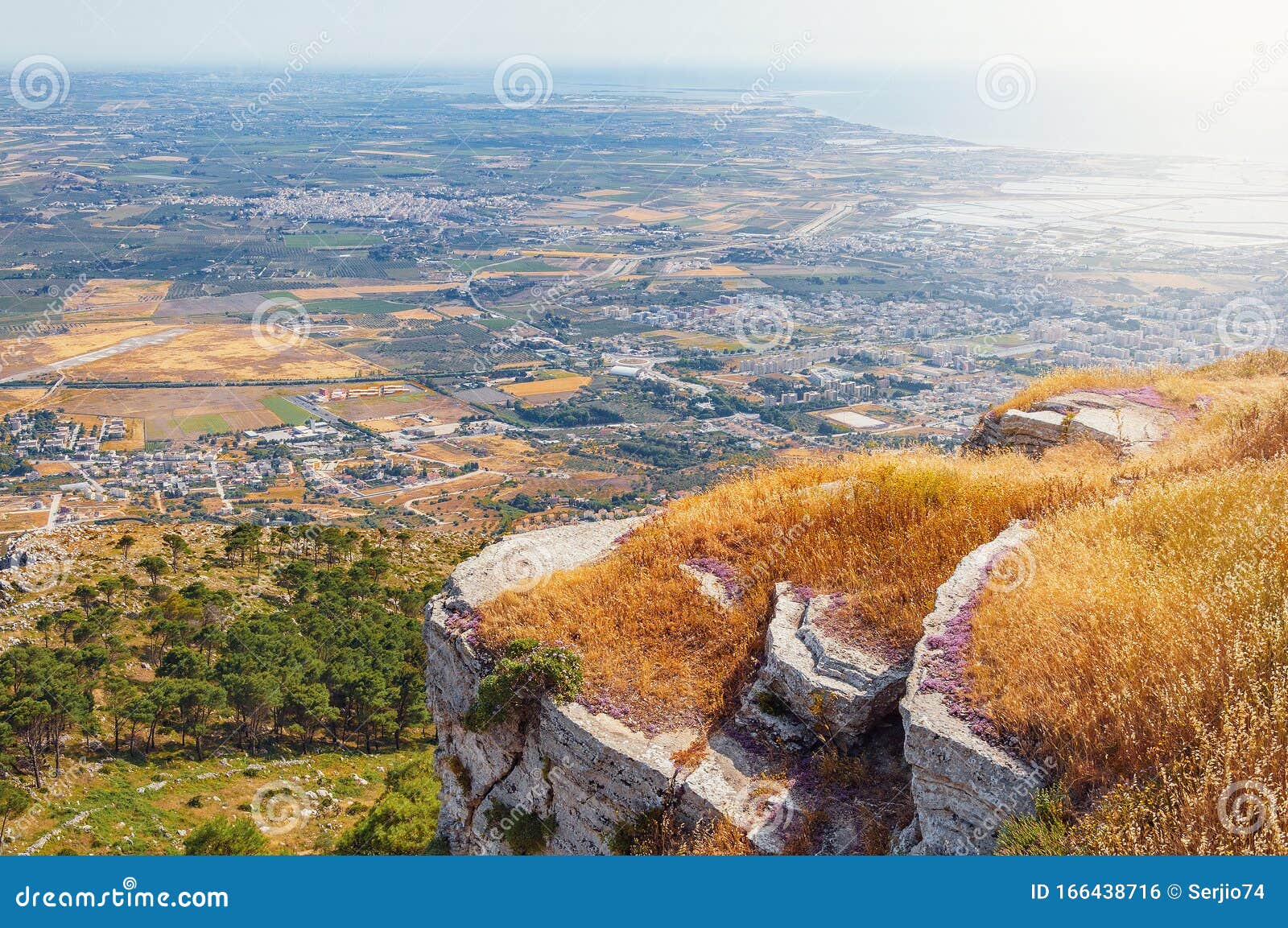 Cliffs with Dry Grass Above the Agricultural Fields Near Trapani. Stock ...
