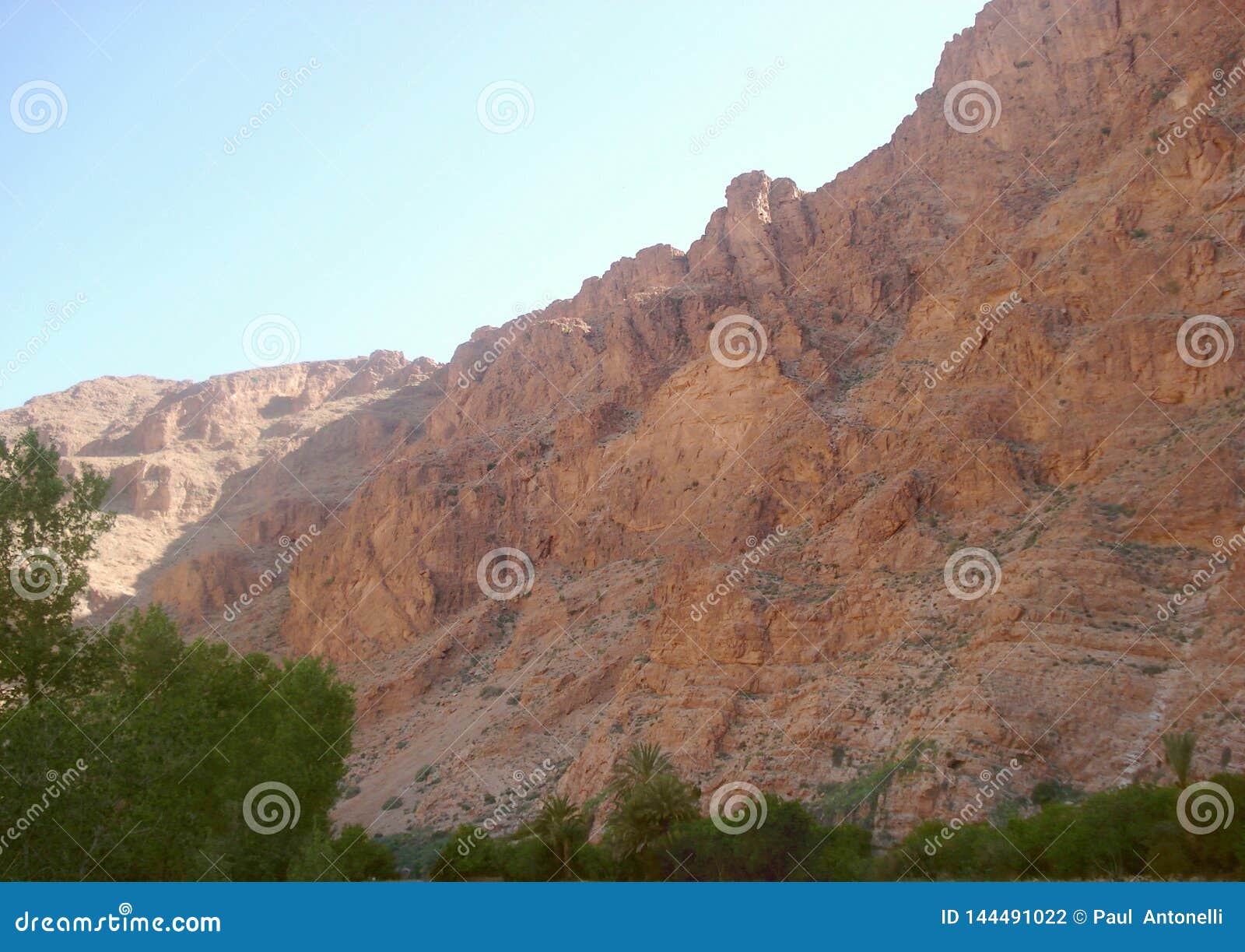 Looming Cliffs Above and in Front Stock Photo - Image of district, life ...