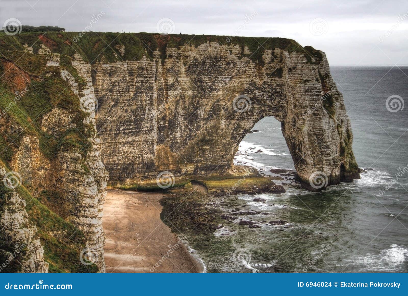 Cliffs and a natural arch stock photo. Image of evening - 6946024