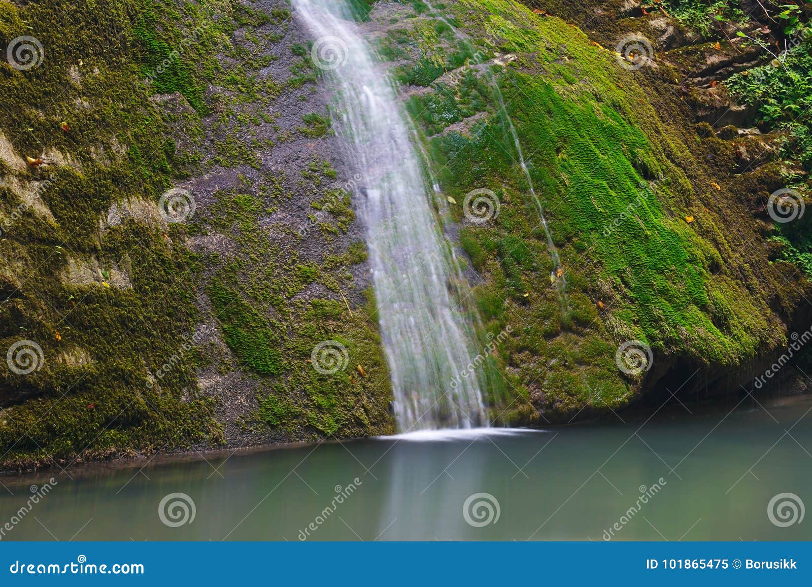 Cliffs Overgrown with Moss with Waterfall Flowing Down Stock Image ...