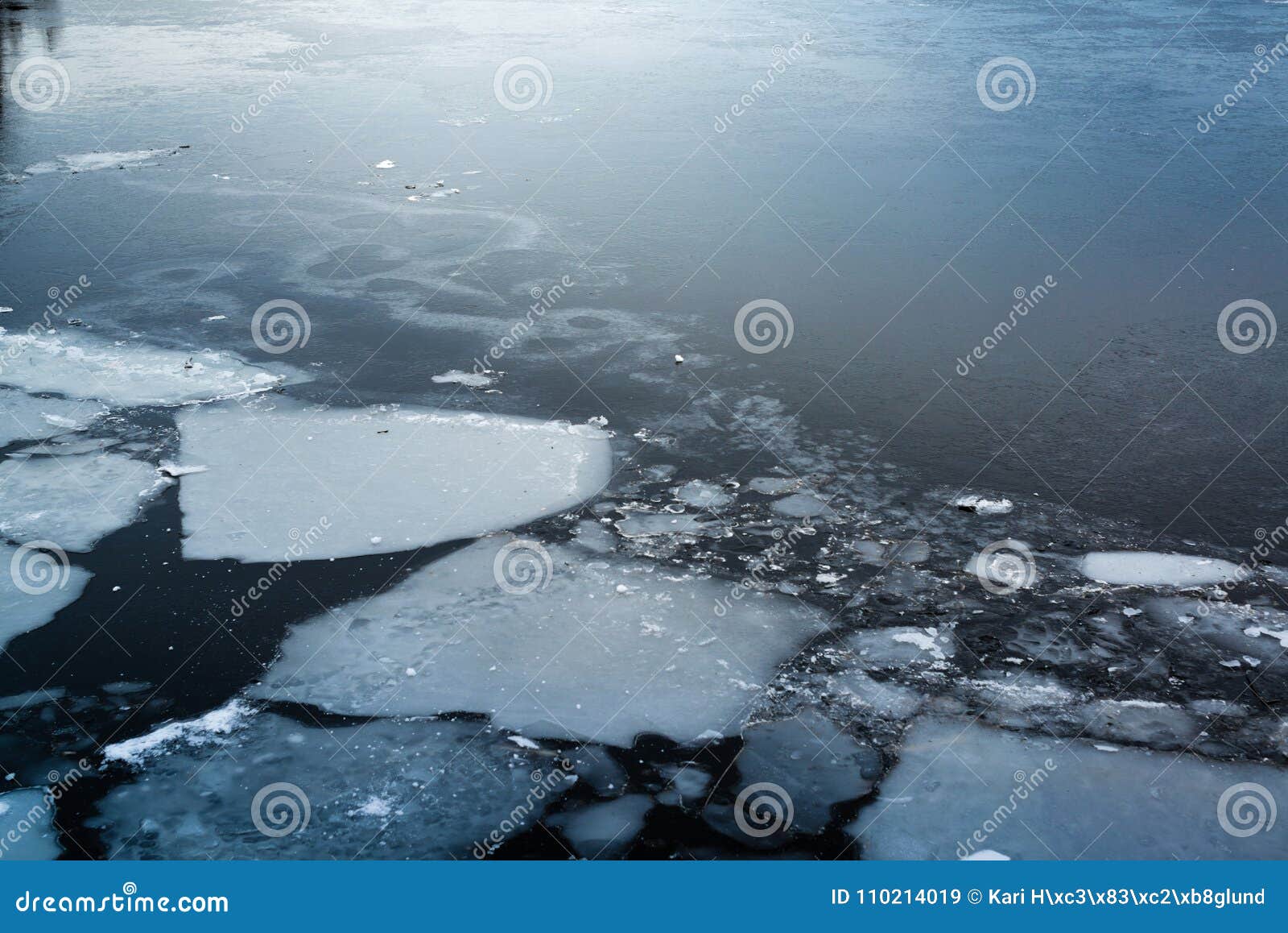 Cracked ice on water stock image. Image of environment - 110214019