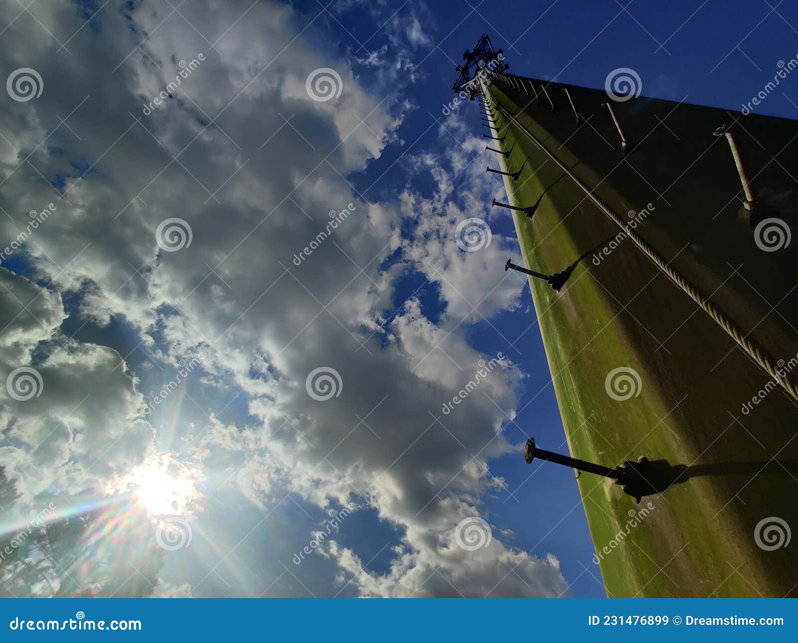 Tower Climber And Working On Cellular Tower System. Royalty-Free Stock ...