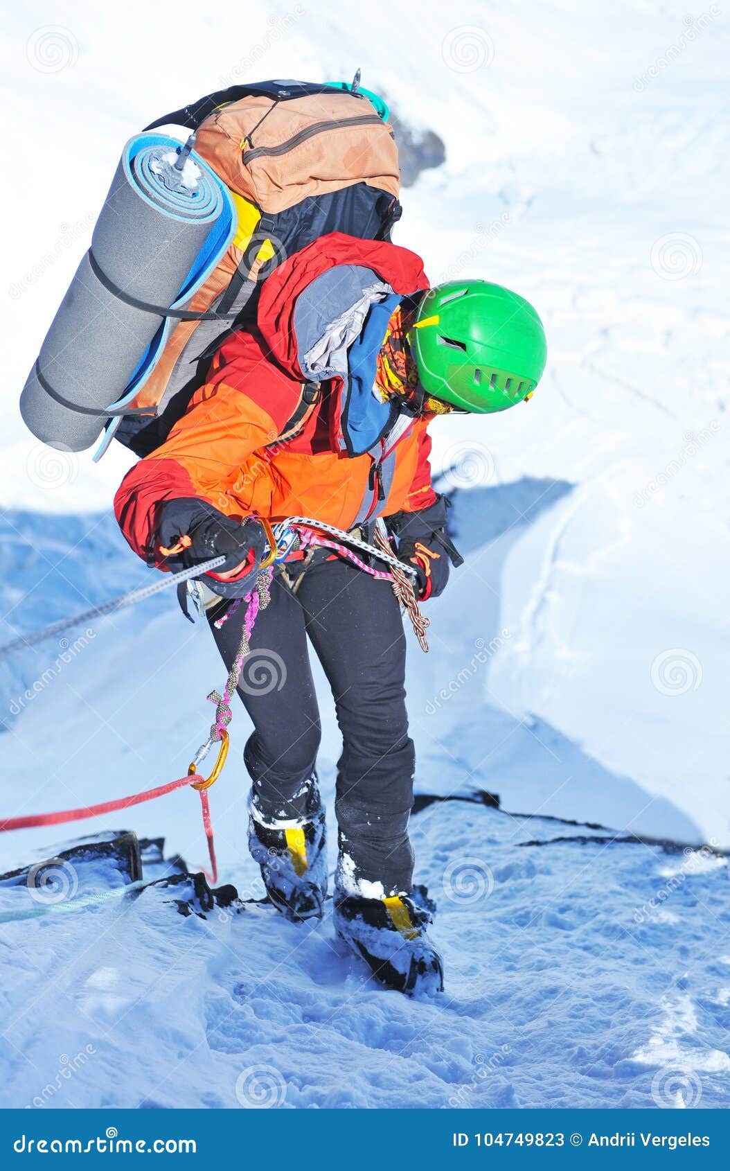 Climber Abseiling from the Mountain Peak. Climbing and Mountaineering ...